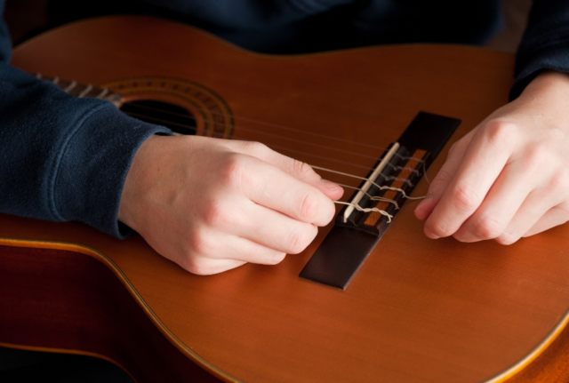 How to Restring a Classical Guitar Guide - Guitar Space